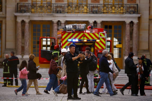 Palace of Versailles evacuated after fire at Paris tourist attraction ...