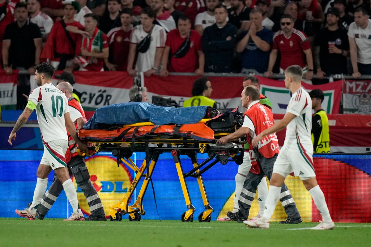 Hungary striker suffers broken bones in face after horror collision ...