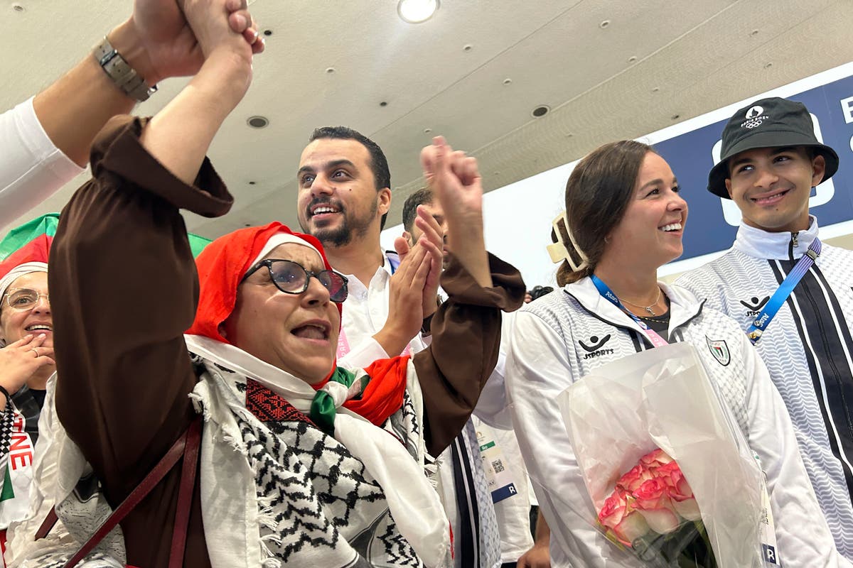 Palestinian Olympic team greeted with cheers and gifts in Paris | The ...