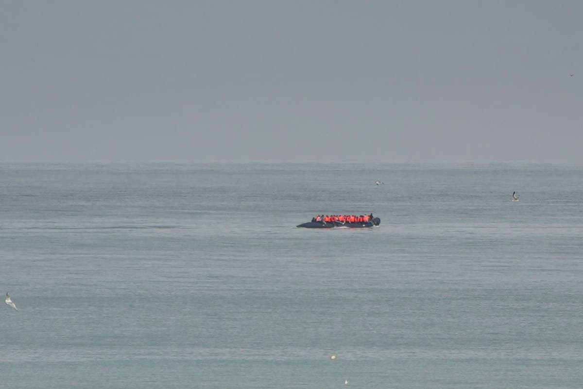 Migrant boat seen trying to cross English Channel day after 12 people died in capsize horror ...
