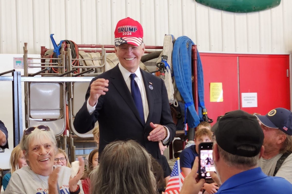Pic of Biden wearing Trump hat sends MAGA fans into meltdown – but ...