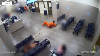 Inmate caught on camera sneaking past guard to assault woman on ...