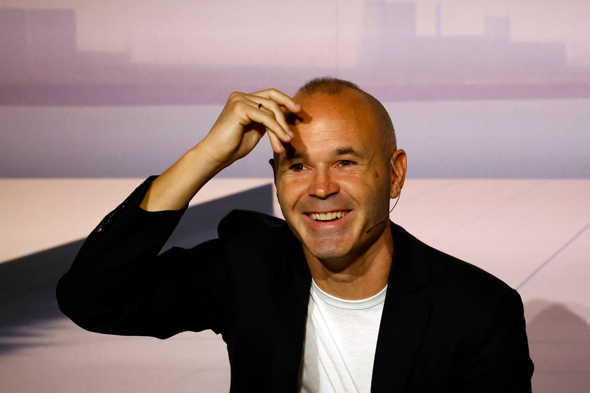 Former Spain and Barcelona great Andres Iniesta retires from football ...