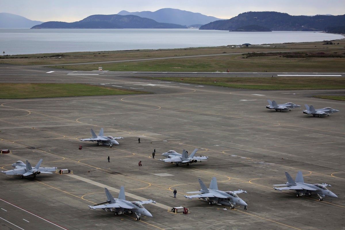 The US Navy says a fighter jet with two on board crashed in Washington ...