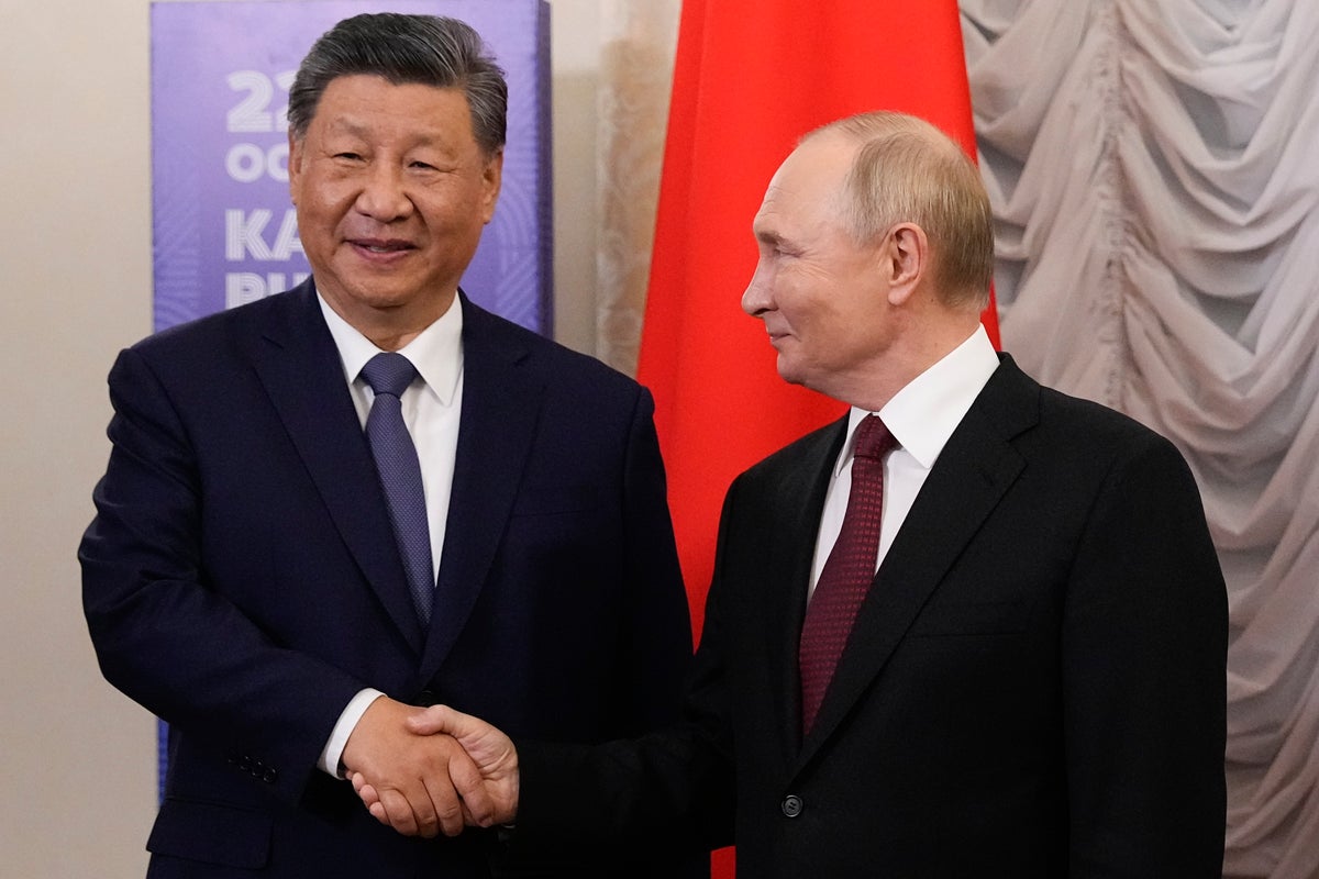 Putin hosts Global South leaders at BRICS summit meant to ...