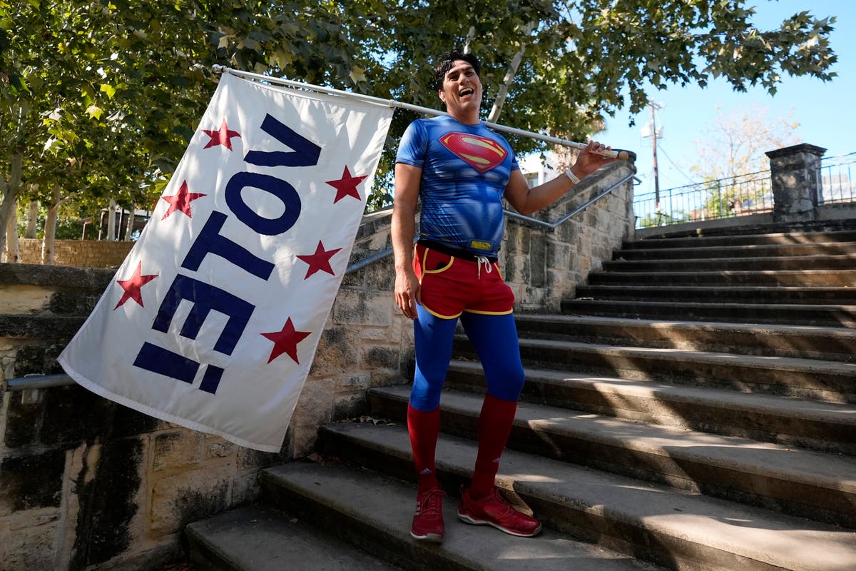 AP PHOTOS: An artist summons Superman to remind people the power of ...