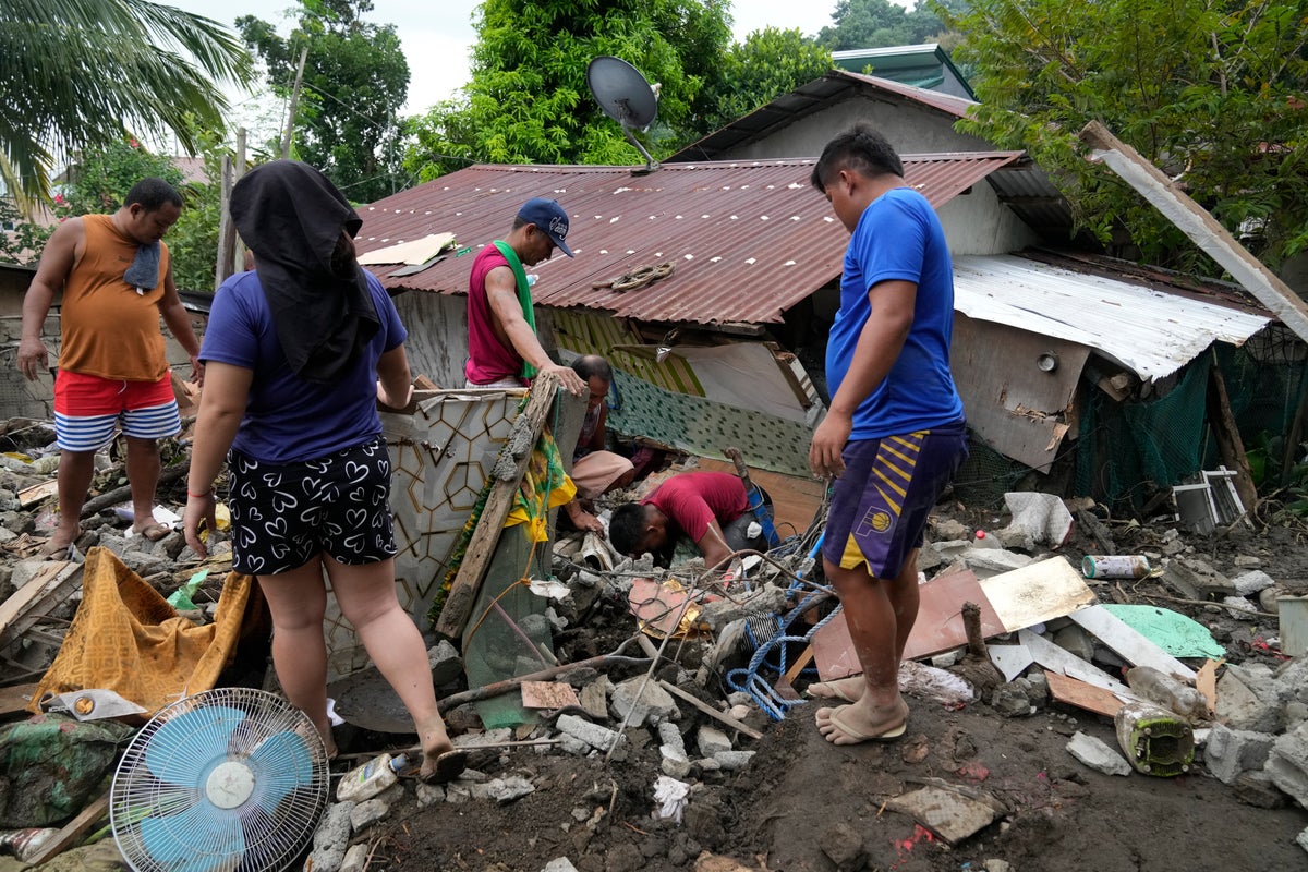 At least 115 dead and missing in massive flooding and landslides in ...