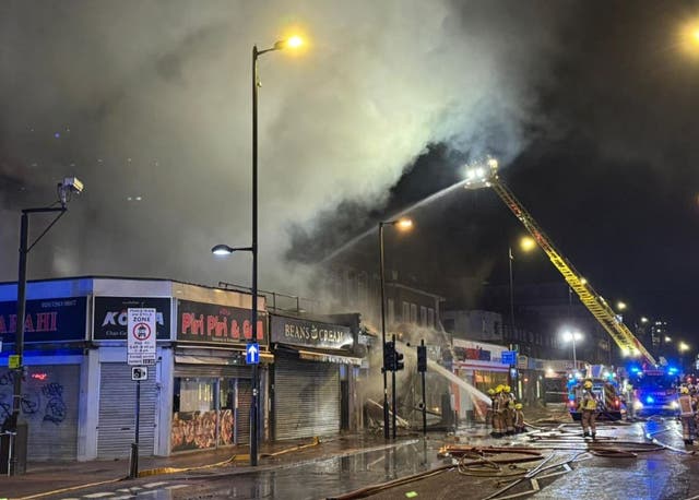 Five people in hospital after fire breaks out at north London takeaway ...