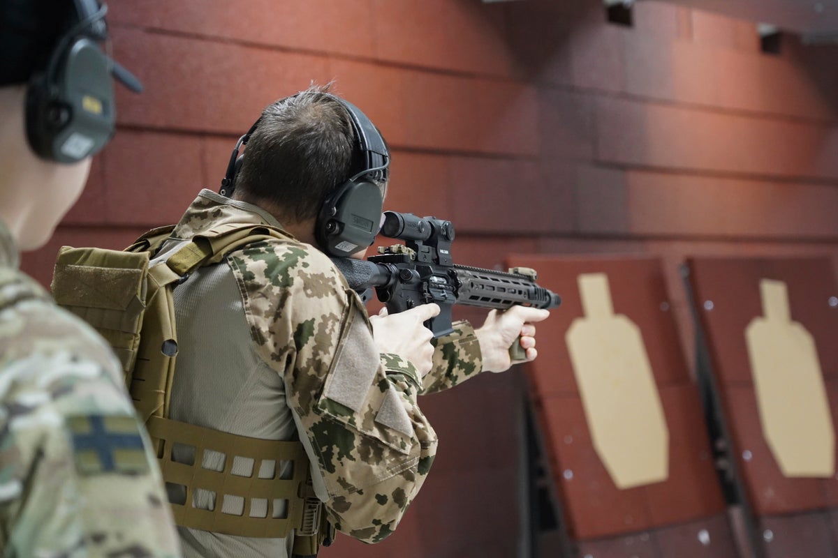 As Russia's threat looms, guns and defense training surge in Finland ...