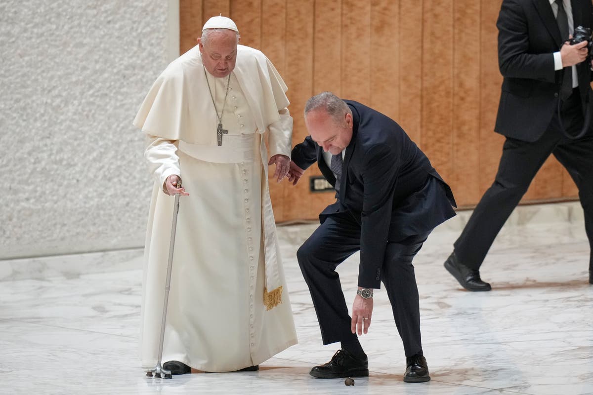 Pope Francis stumbles as his walking stick snaps at Vatican audience ...