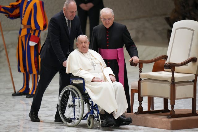 Pope Francis stumbles as his walking stick snaps at Vatican audience ...