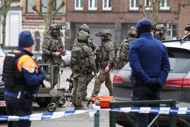 Belgian police hunt for masked gunmen after shooting outside Brussels ...