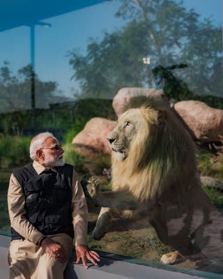 Modi feeds lion cubs as he inaugurates controversial private zoo run by ...