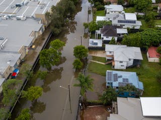 Sharks swim in flooded canals as Australia grapples with cyclone Alfred ...
