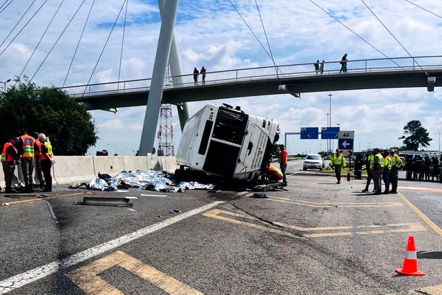 Johannesburg bus crash: 12 dead, 45 injured after bus overturns on ...