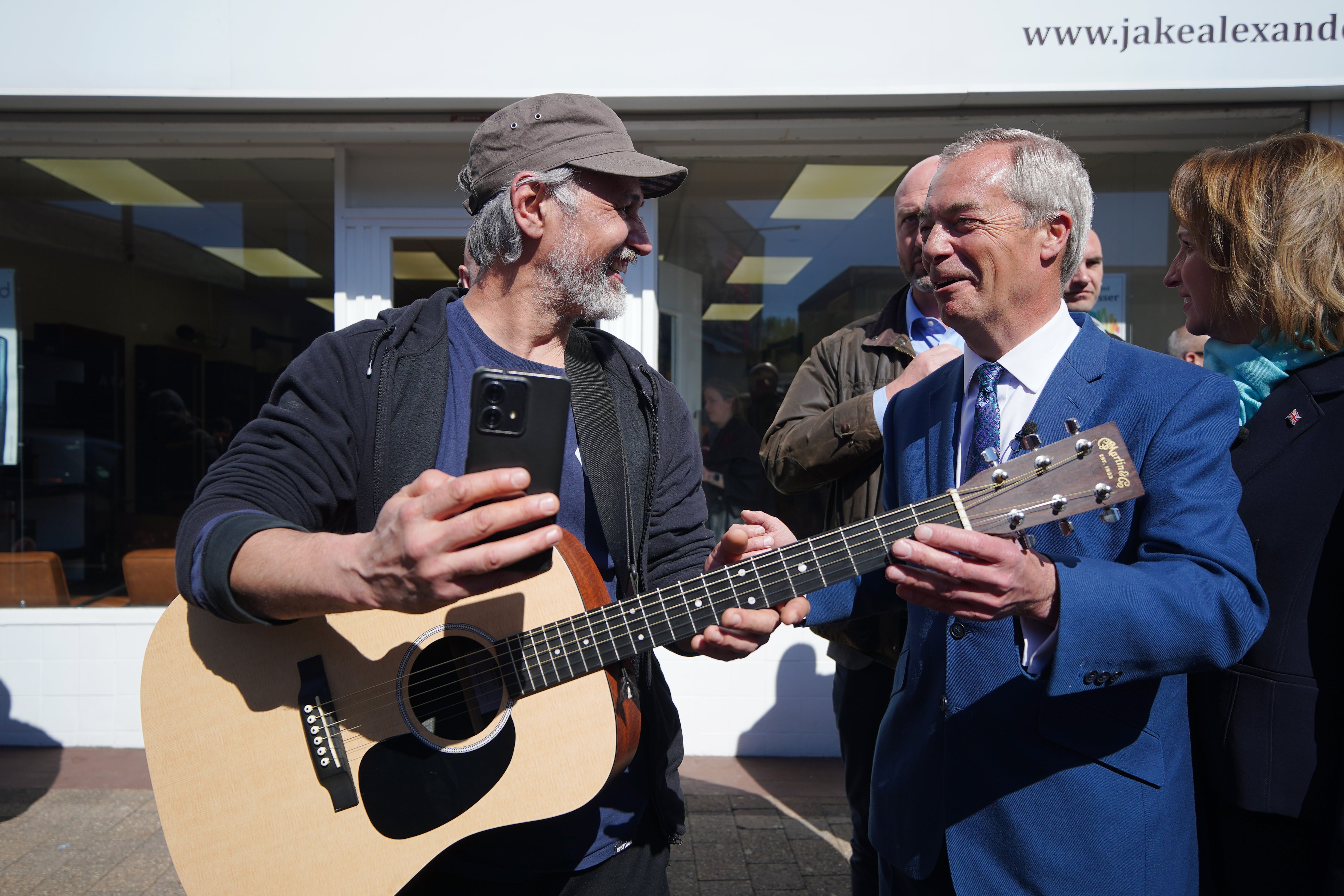 Nigel Farage serenaded in the street on campaign visit | The Independent