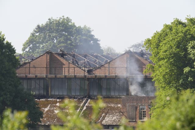 Two firefighters and member of public dead after large fire at ex-RAF ...
