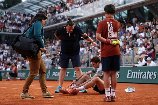 Ugo Humbert retires injured as Jacob Fearnley sets up Cameron Norrie ...