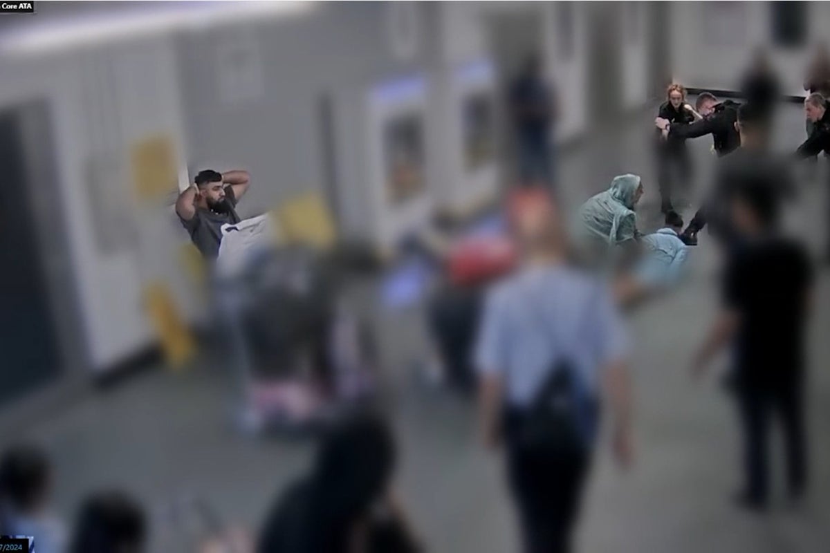 Footage of alleged attack on officers at Manchester Airport shown to ...