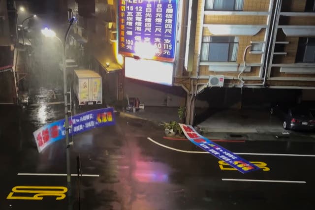 Typhoon Danas threatens China with flash floods after killing two ...
