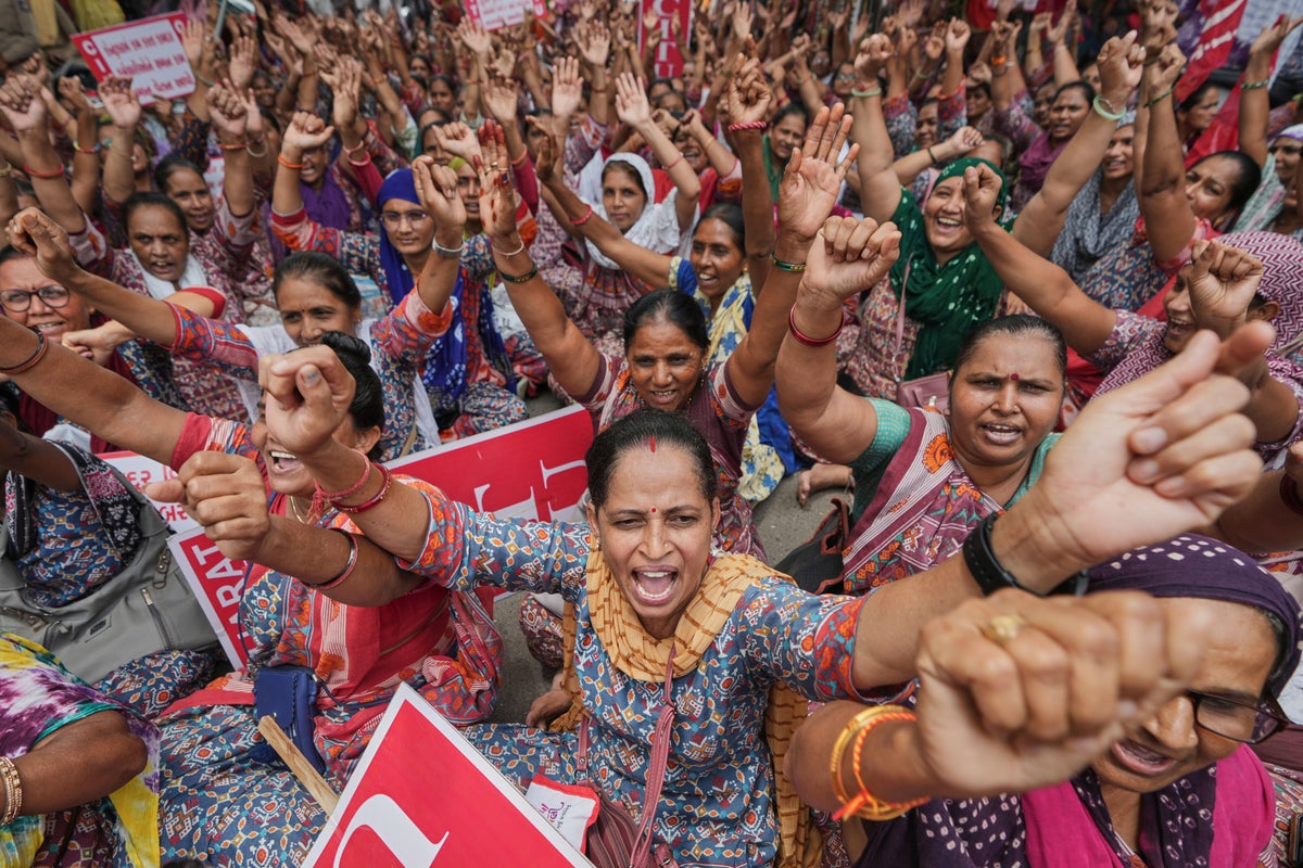 Indian workers go on a daylong nationwide strike against Modi's ...
