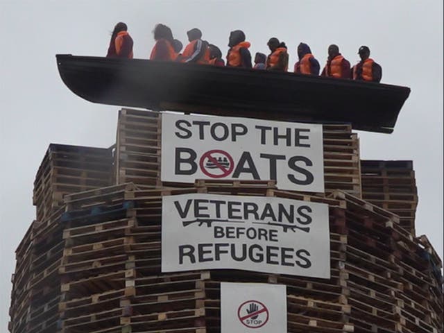Calls for removal of migrant effigies in boat on loyalist bonfire in ...