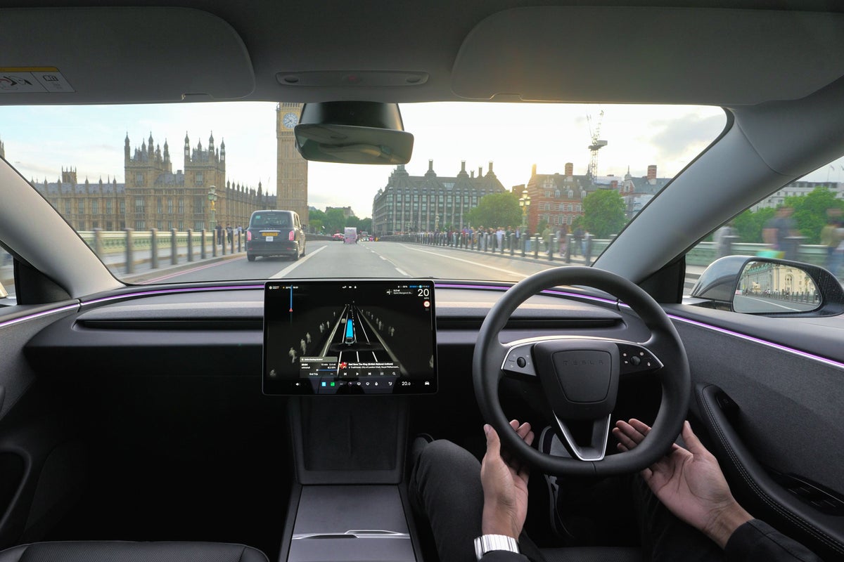 Tesla successfully tests fully self-driving car on UK roads | The ...