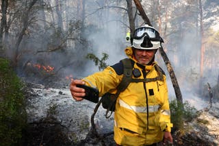 Tourists evacuated as France continues to battle biggest wildfire since ...