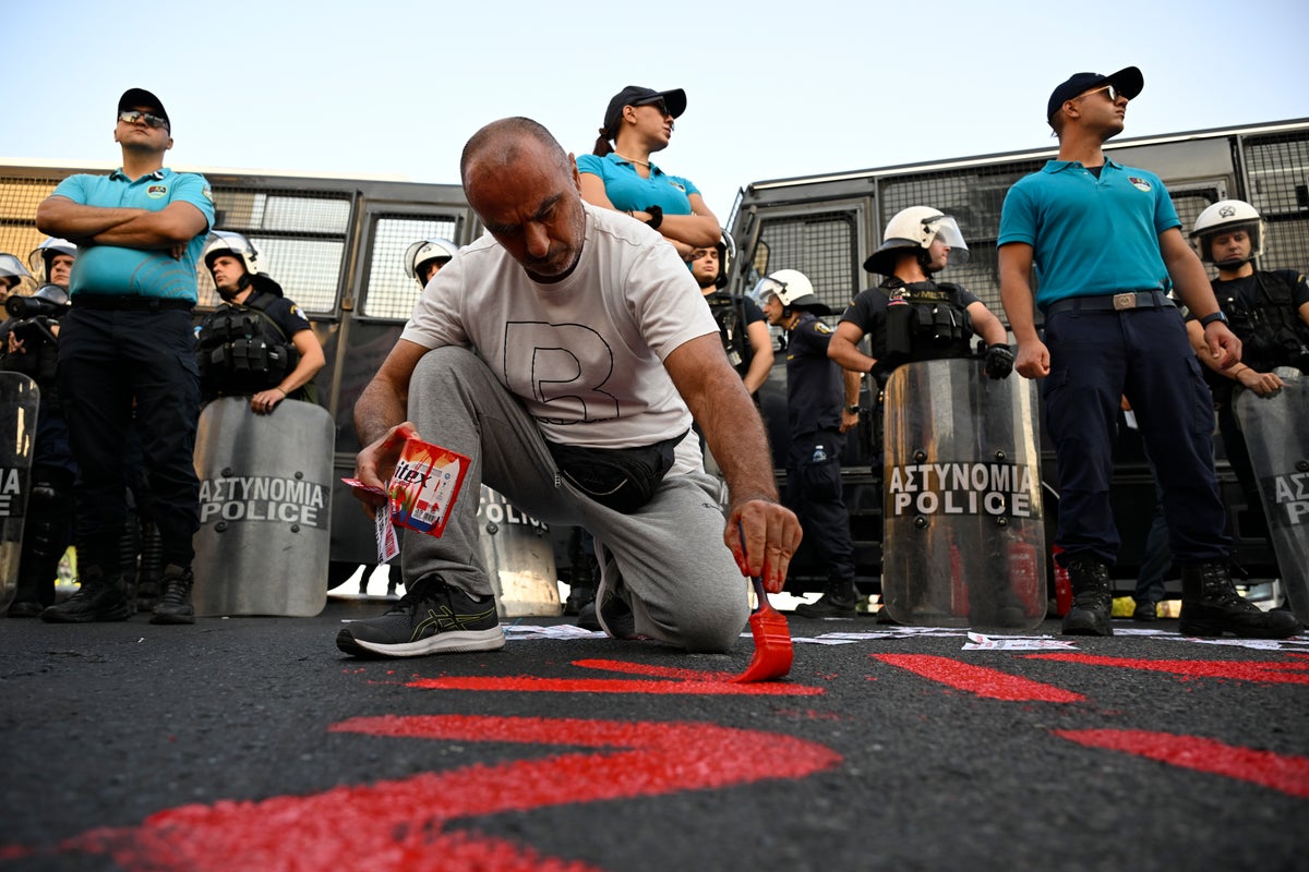 Riot police block protesters from approaching Israeli cruise ship in ...