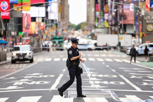 Person of interest detained after bomb scare leads to Times Square ...