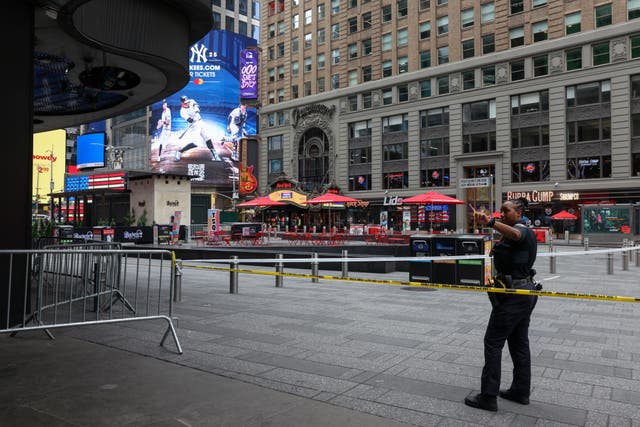 Person of interest detained after bomb scare leads to Times Square ...
