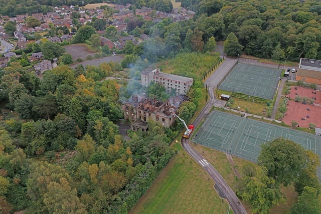 Girl, 14, arrested after fire at Grade I-listed Woolton Hall in ...