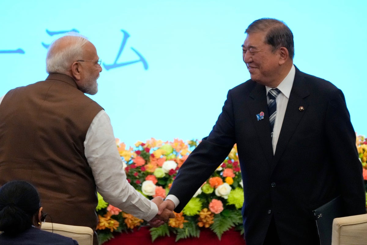 India's Modi meets Japan's Ishiba as he begins Asia tour | The Independent
