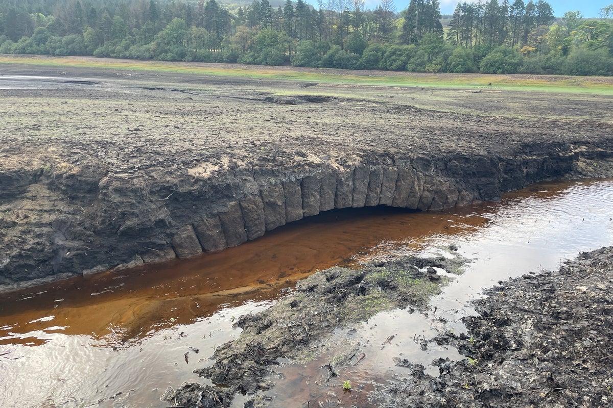Drought uncovers lost structures of famous Peak District reservoir ...