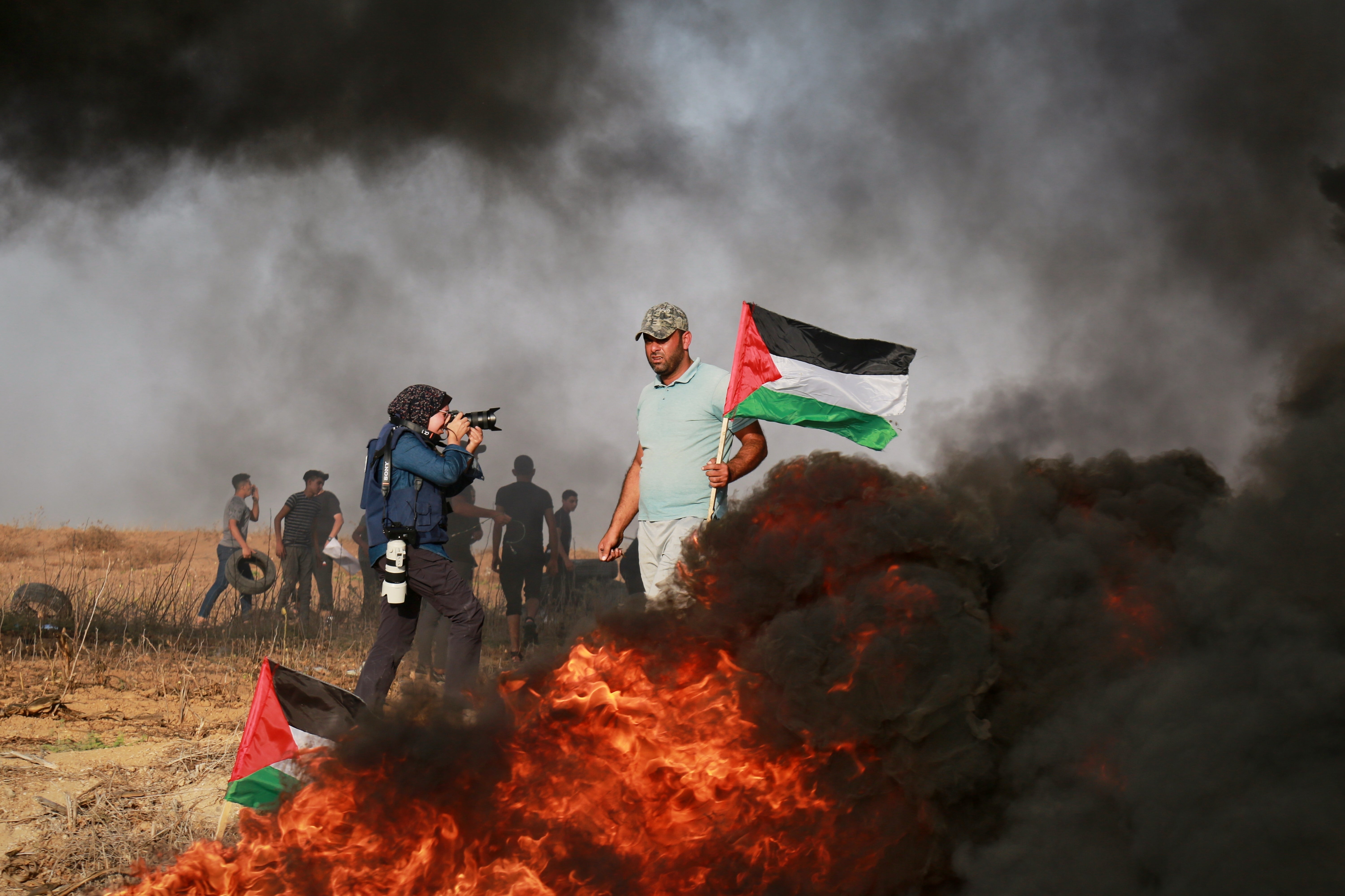 An AP photographer shares the stories behind some of her most poignant ...