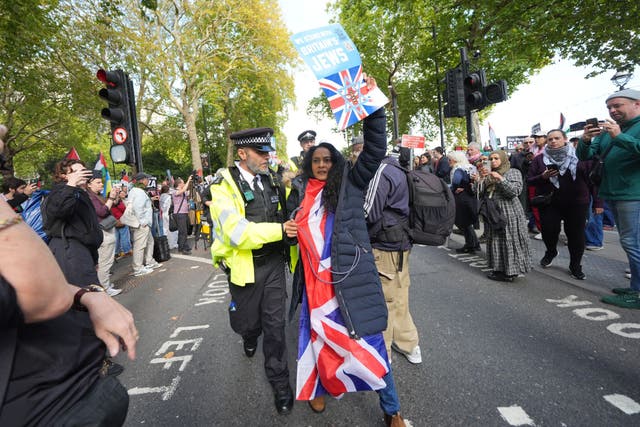 Thousands of protesters march through central London to mark two years ...