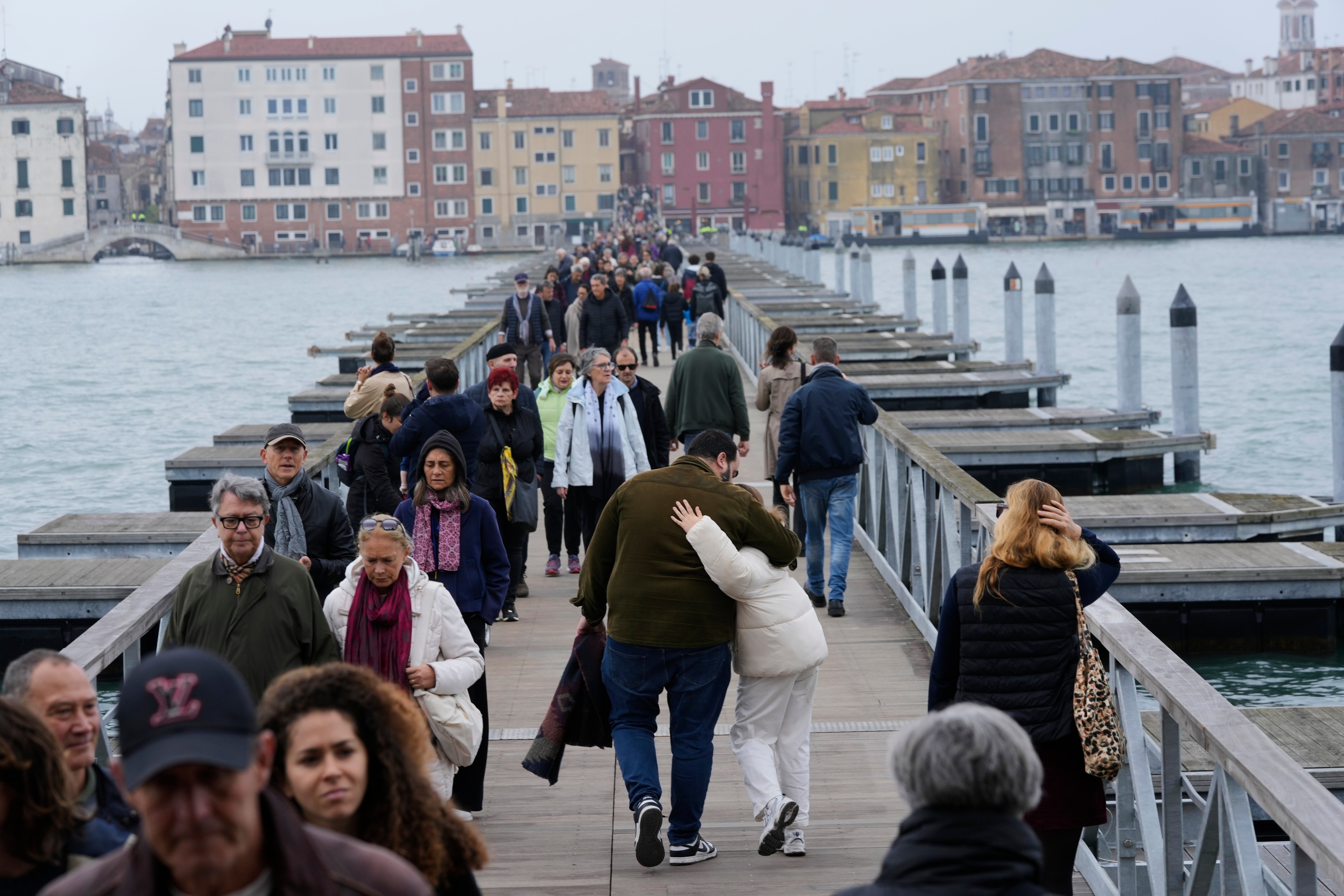 Venice revives a quarter-mile floating bridge to island cemetery for ...