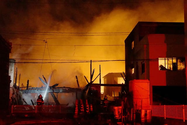 One killed and at least 170 homes damaged as huge fire tears through ...