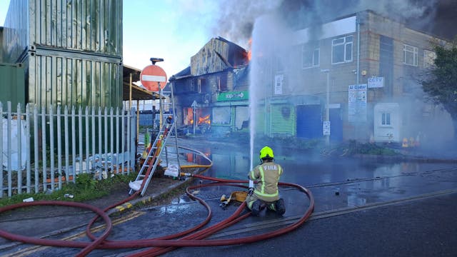 Major incident declared after fire breaks out at London warehouse ...