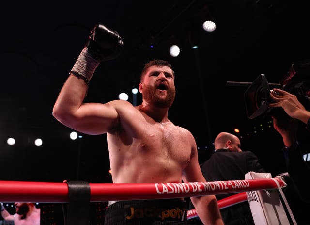 Johnny Fisher survives early knockdown to win rollercoaster comeback ...