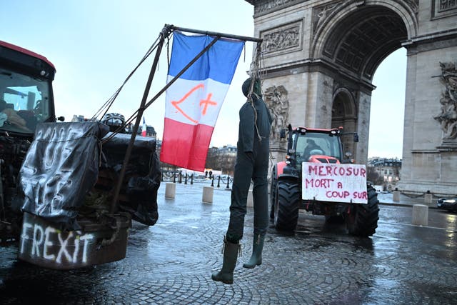 French farmers force their way through Paris as tractor protest hits ...