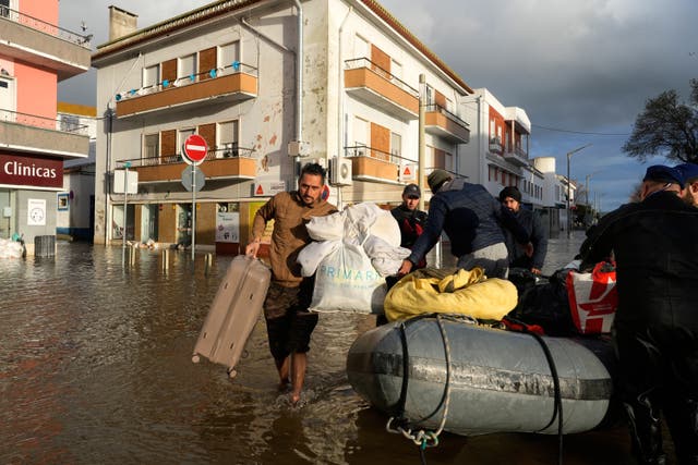 Portugal floods force 3,000 evacuations as motorway collapses and ...