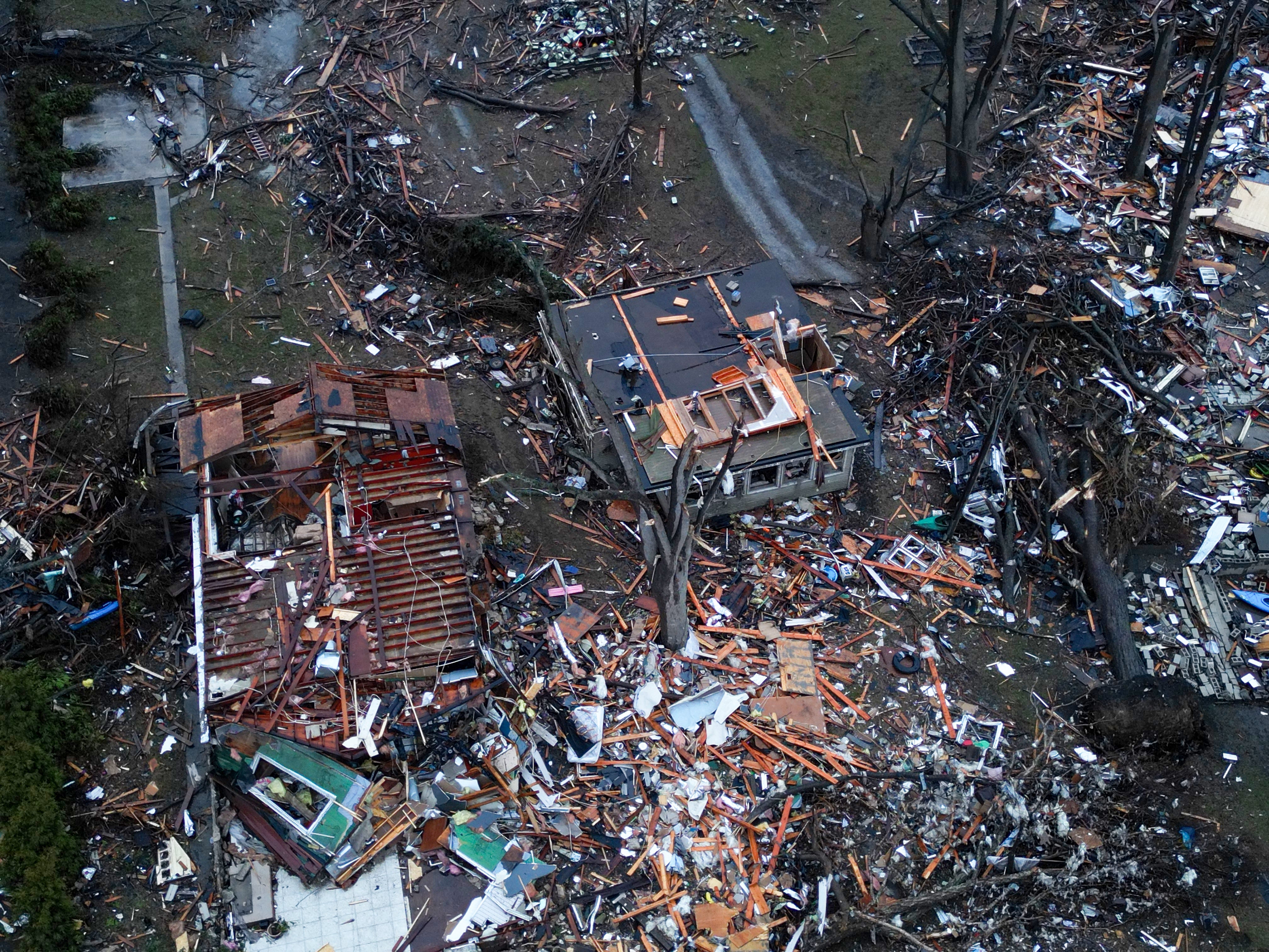 Two killed as tornadoes leave trail of destruction in Illinois and ...