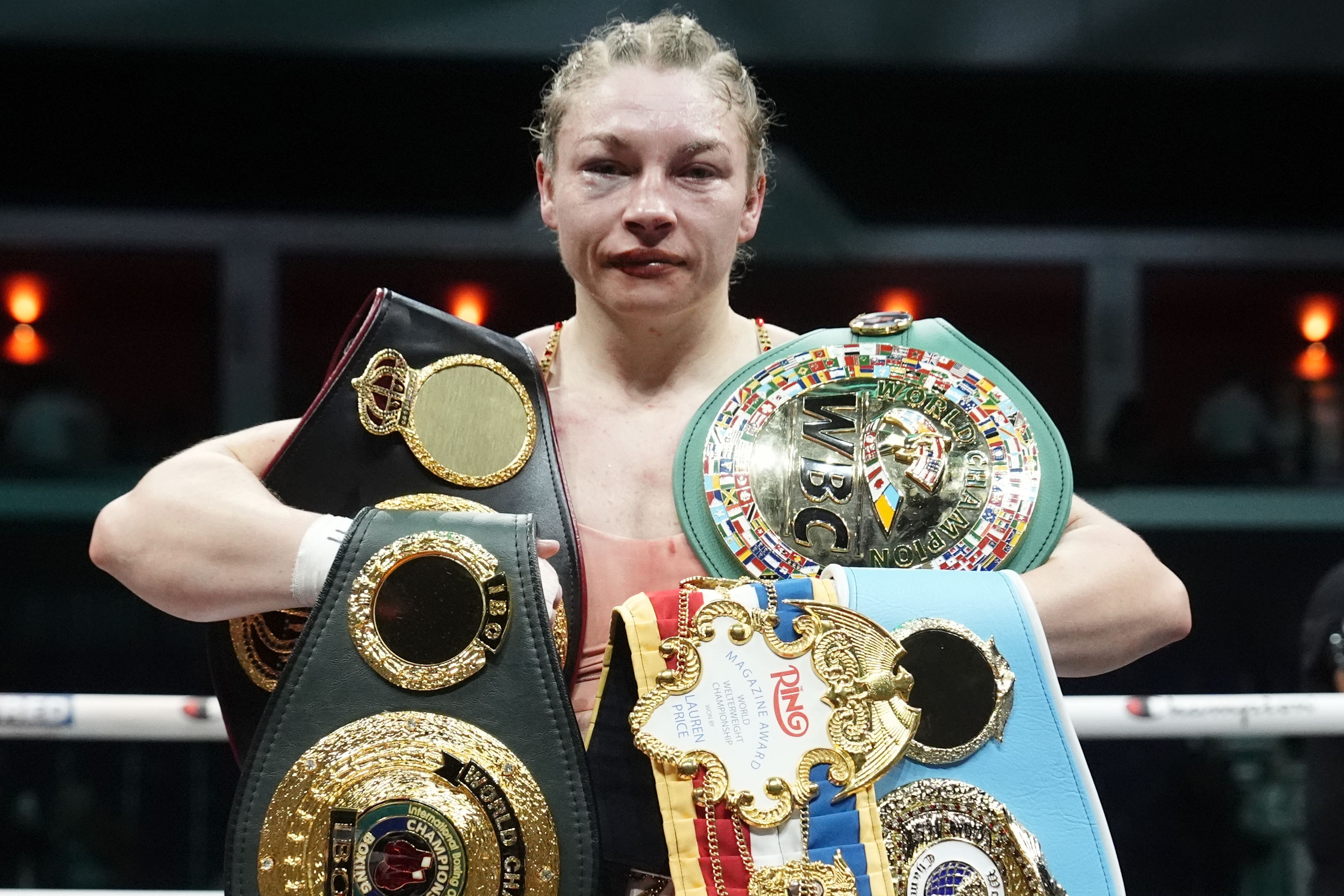 Lauren Price comes through toughest battle yet to retain world titles ...
