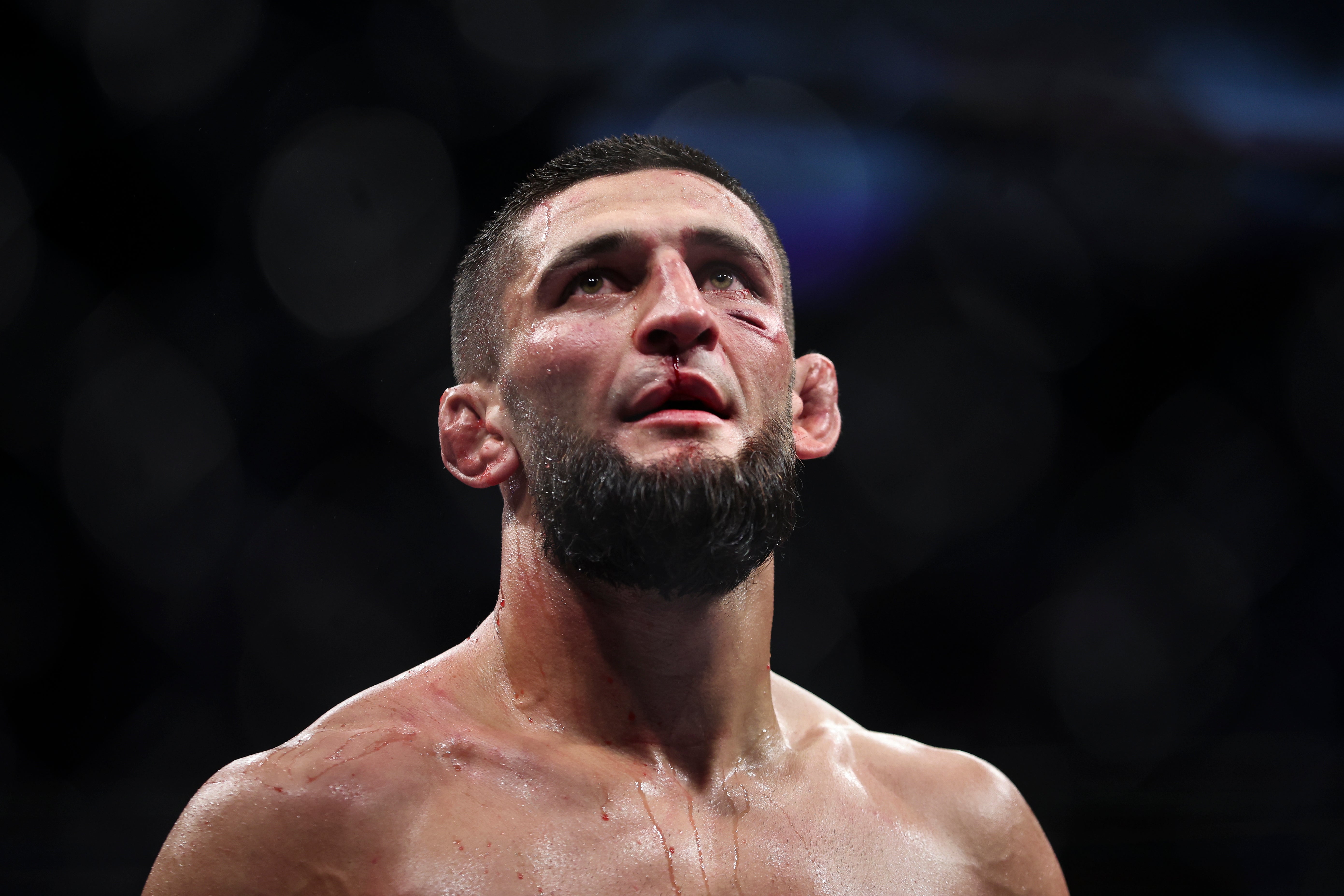 Khamzat Chimaev kicks Sean Strickland at explosive UFC 328 press ...