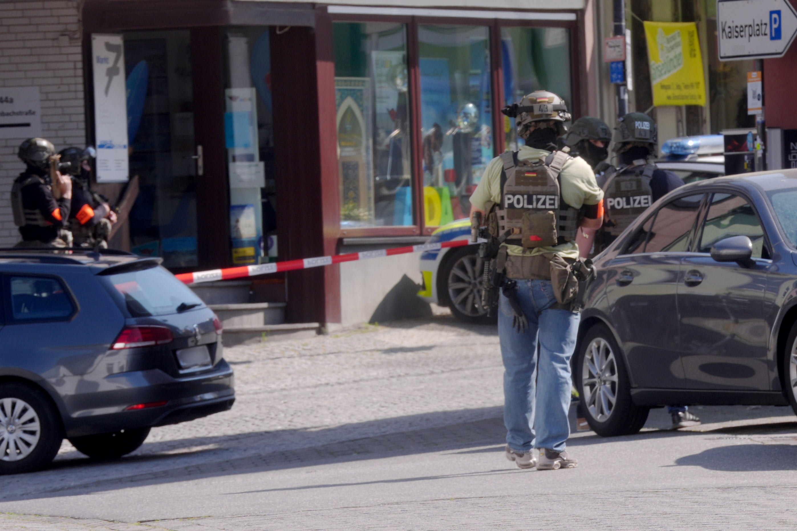 Hostages taken as police surround bank in German town | The Independent