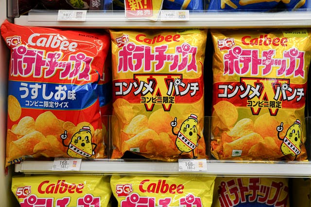Japan’s biggest crisp maker swaps colourful packaging for black-and ...