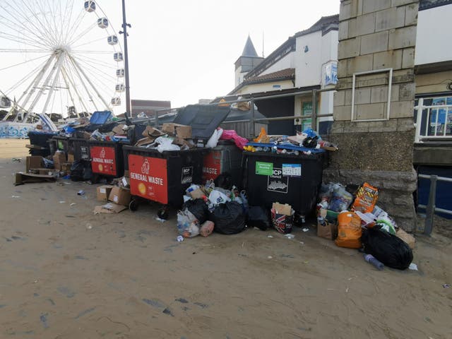 Bournemouth beach buried in rubbish after bank holiday heatwave crowds ...