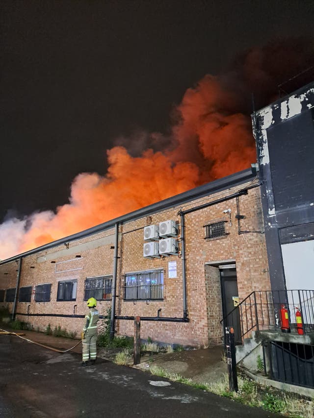 Huge London warehouse fire forces 70 residents to be evacuated as blaze ...