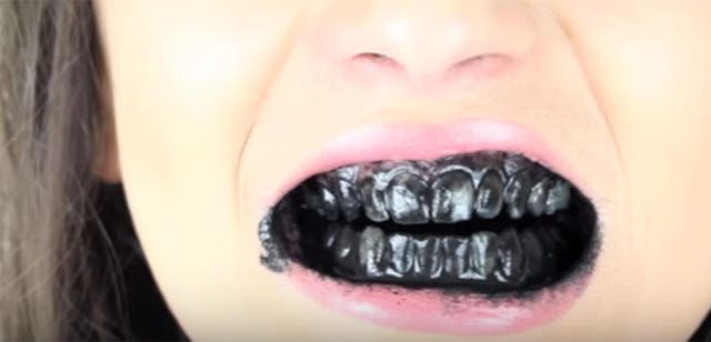Here's why some people are brushing their teeth black - and why it's ...